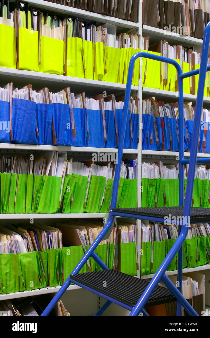 Office life and Interiors Part Two. Files on shelves with blue step ...