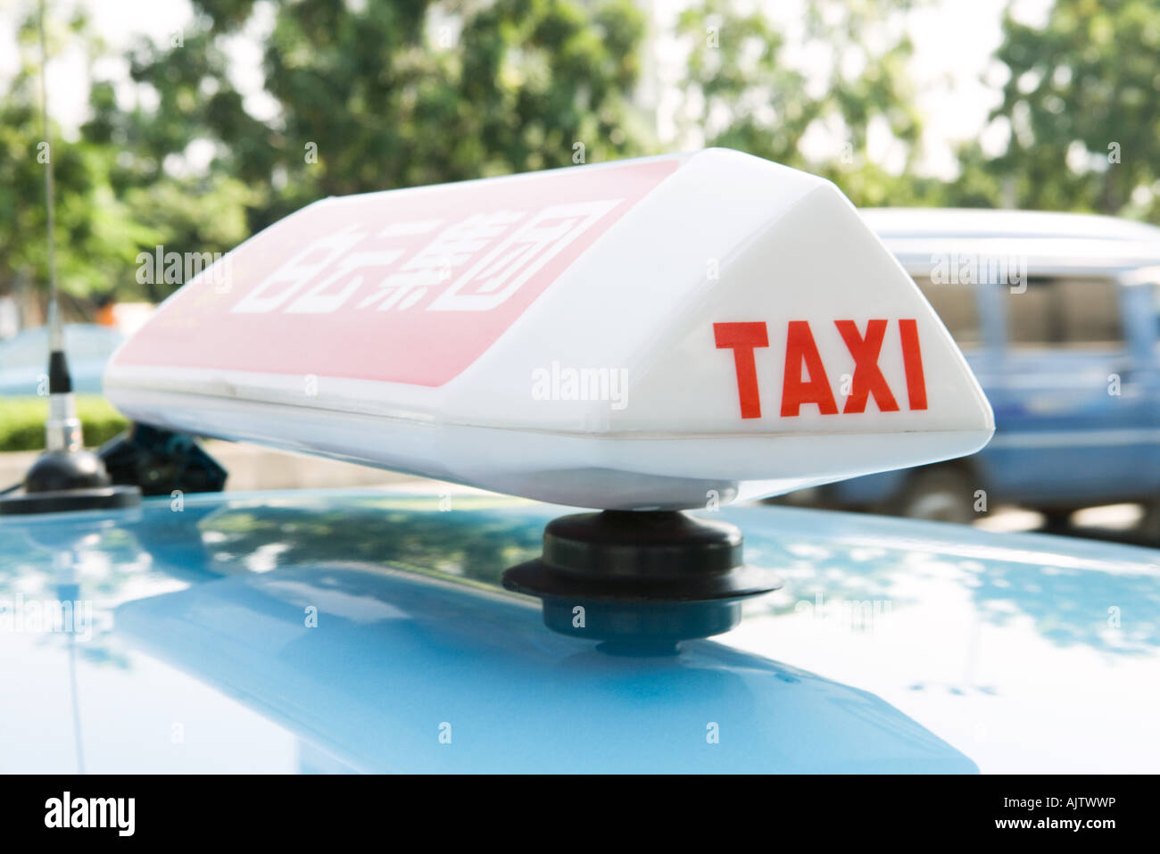 Chinese taxi sign Stock Photo - Alamy