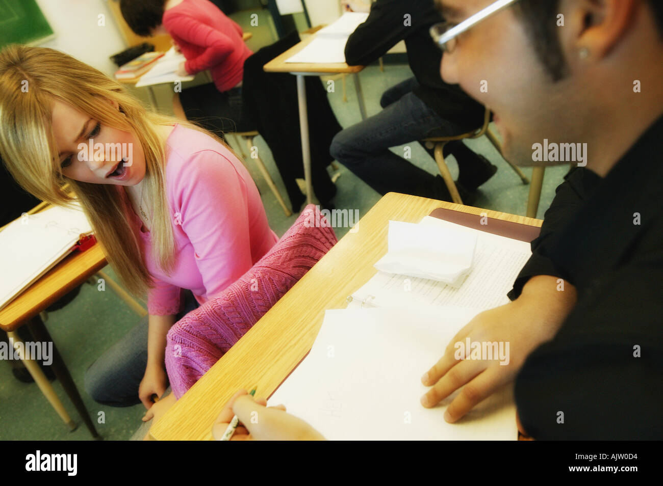 Student writing note Stock Photo - Alamy