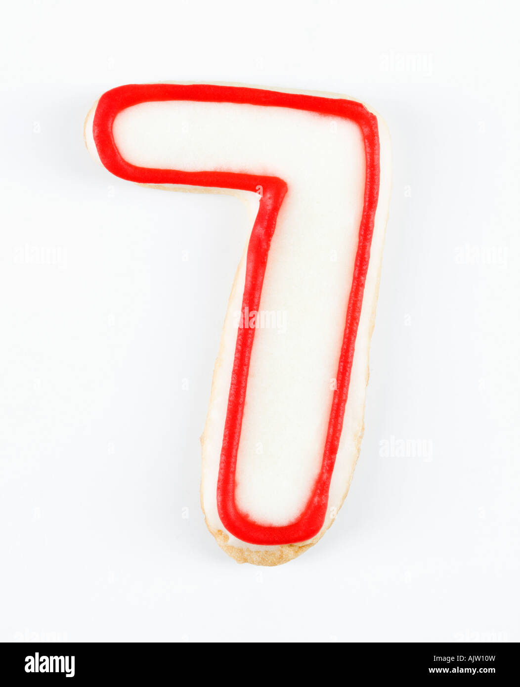 Sugar cookie in the shape of a number seven outlined in red icing Stock ...