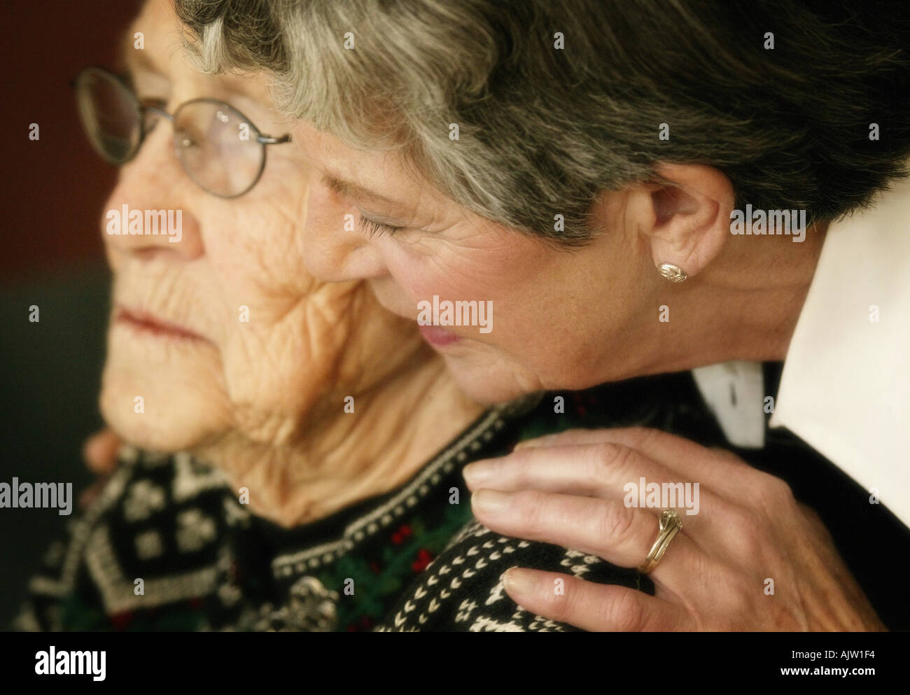 Seniors praying together Stock Photo - Alamy