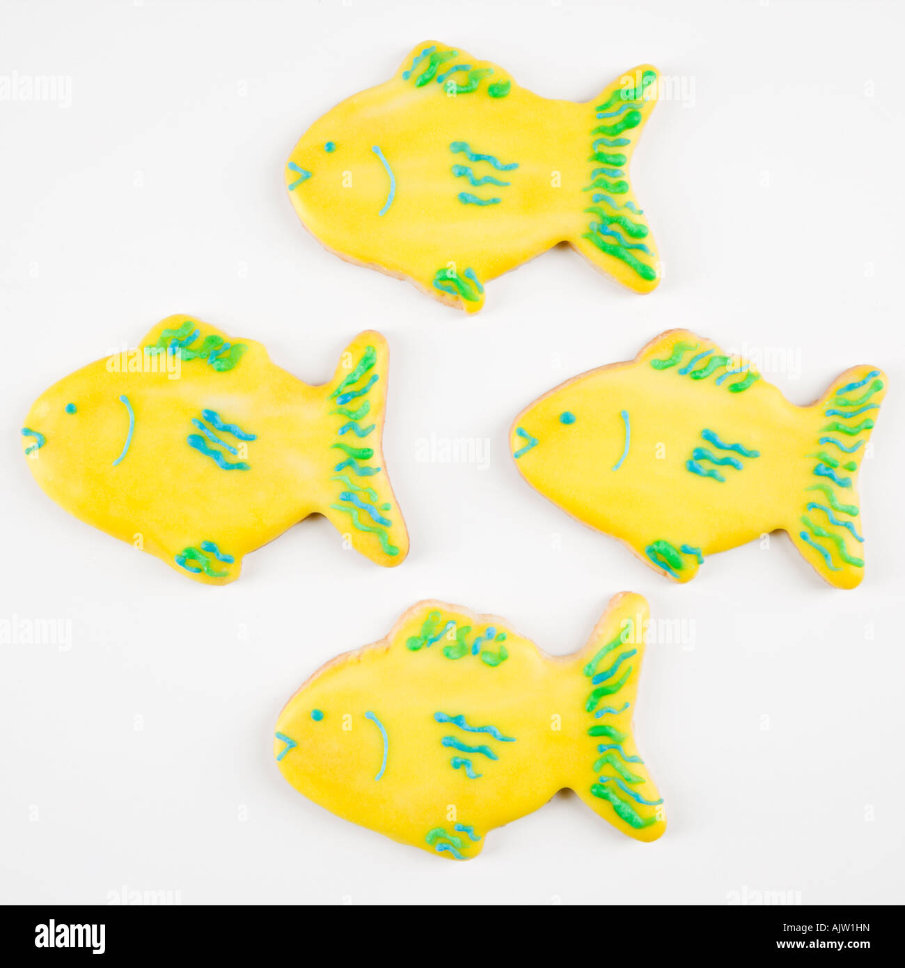 Four fish shaped sugar cookies with decorative icing Stock Photo - Alamy