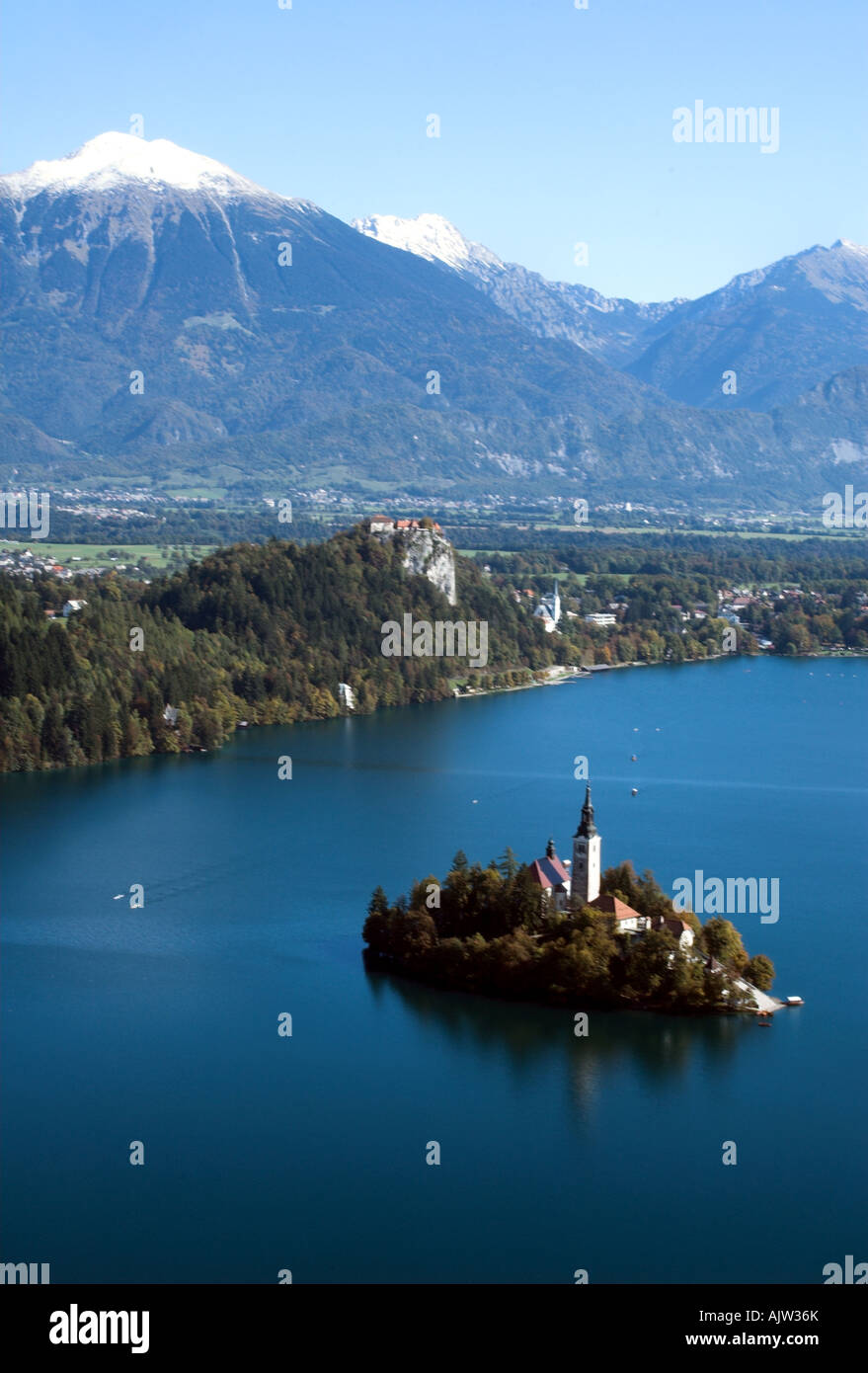 overview of Lake Bled Slovenia snow capped mountains in background ...