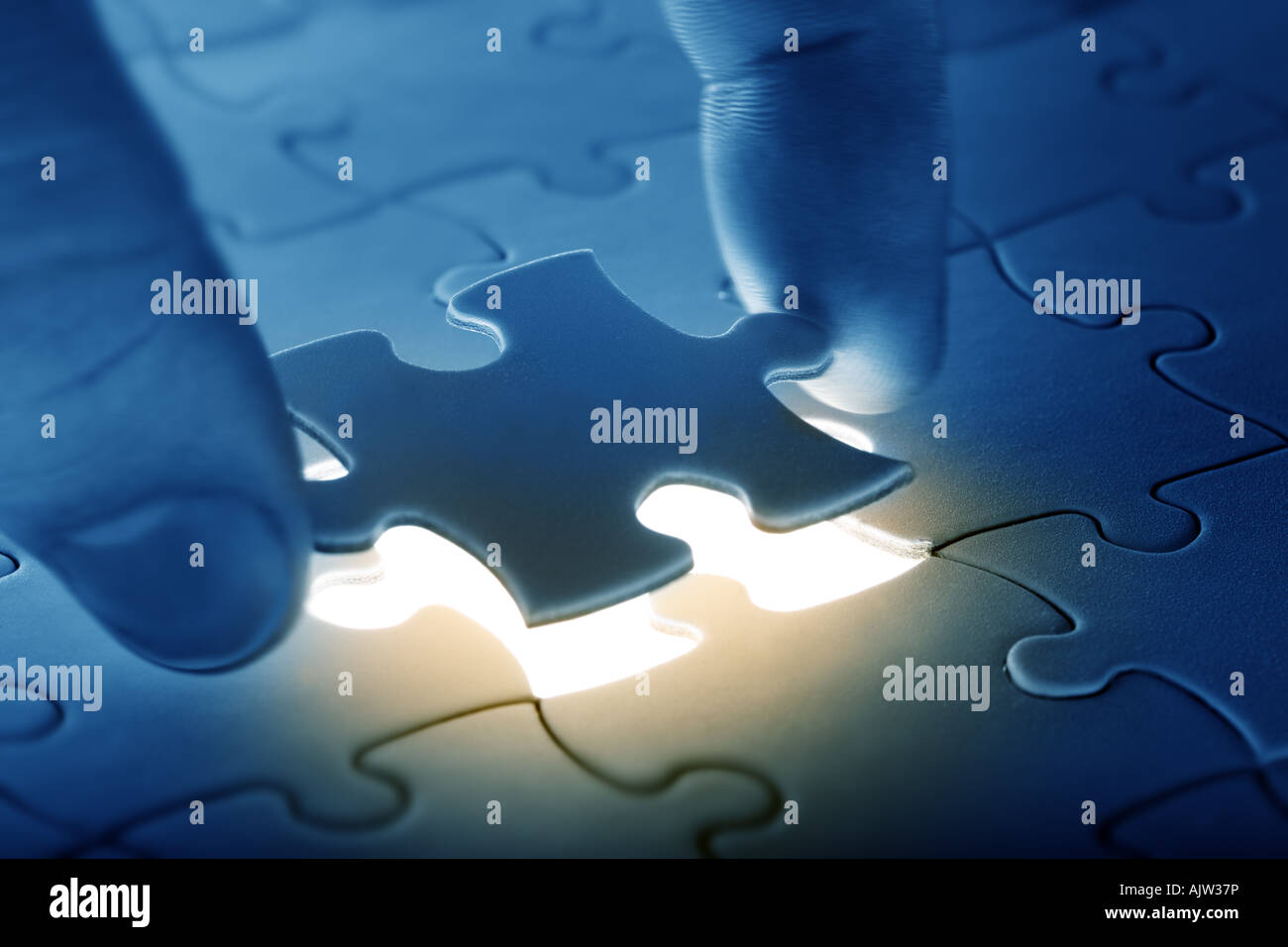 Hands placing last piece of a Puzzle Stock Photo - Alamy Hands placing last piece of a Puzzle Stock Photo - Alamy