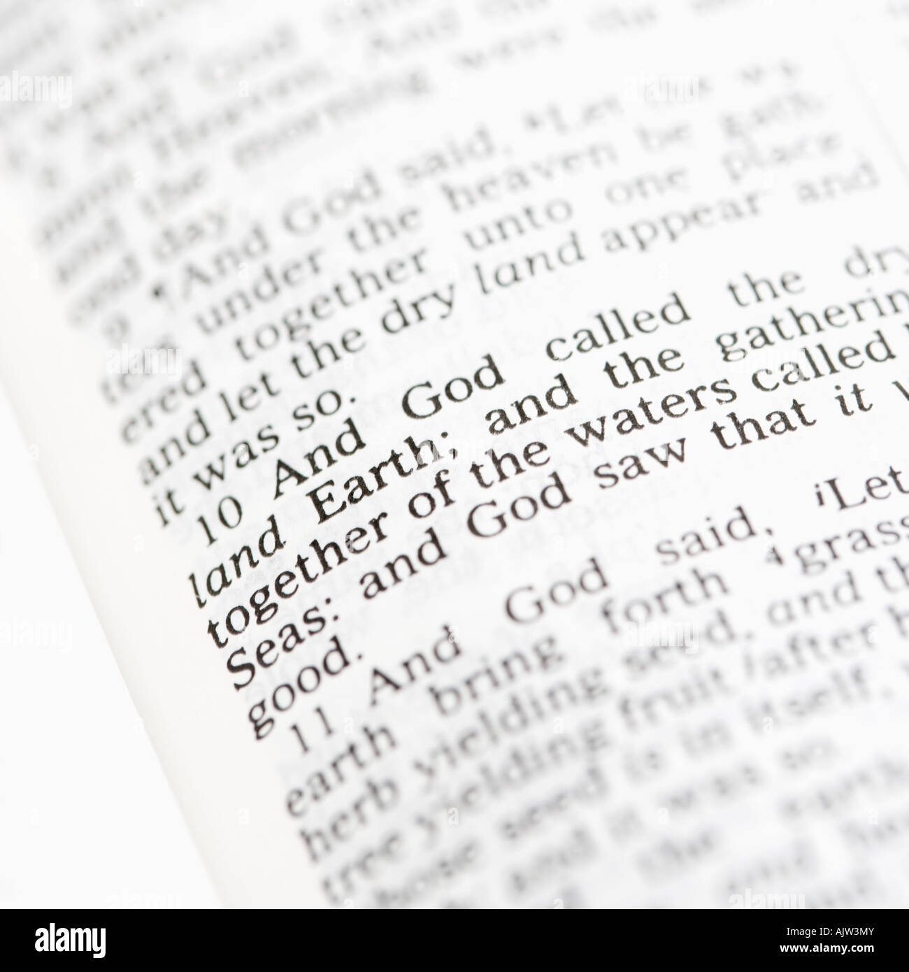 Selective focus of Genesis verses in open Holy Bible Stock Photo - Alamy