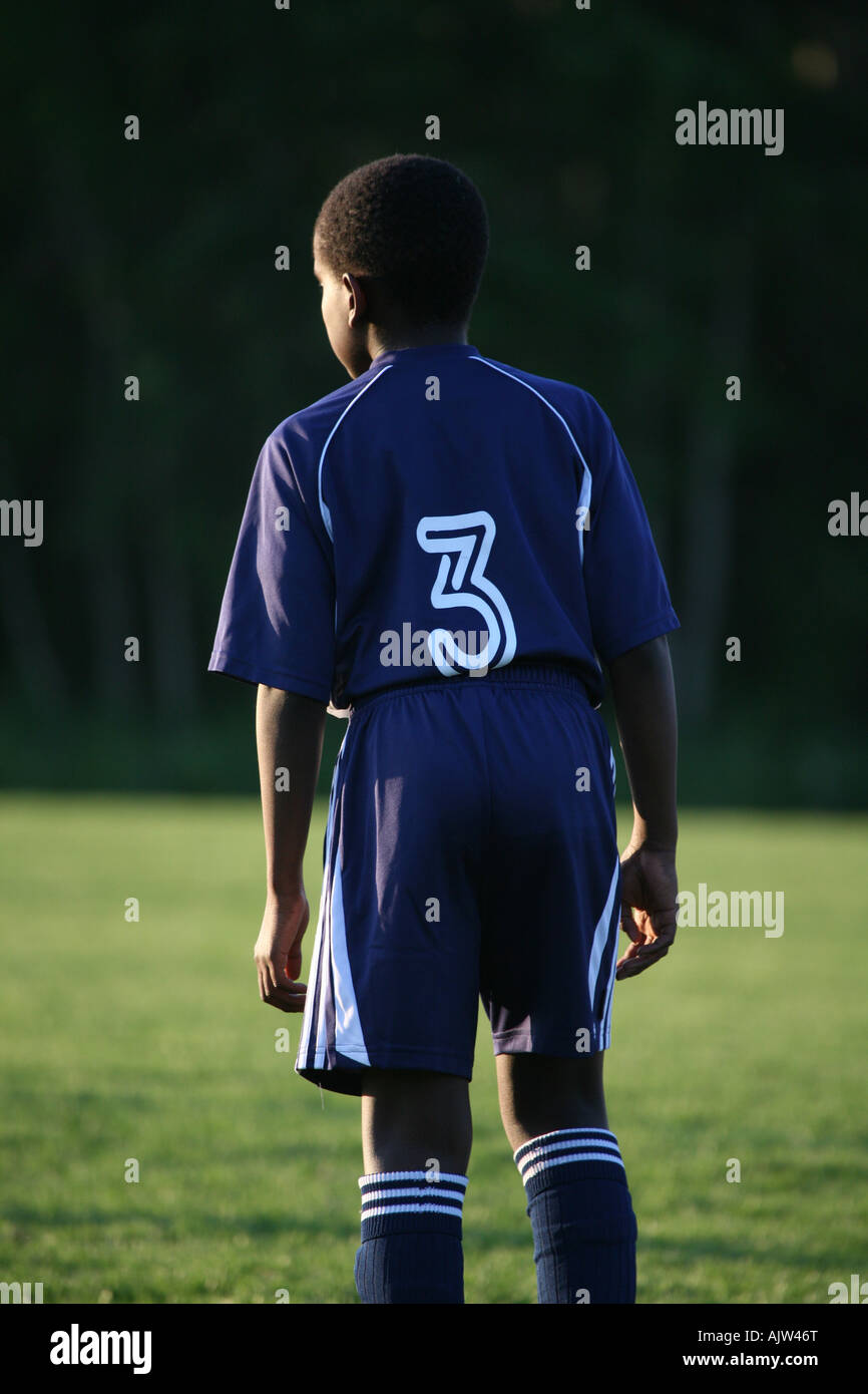 Soccer player watching the play Stock Photo - Alamy