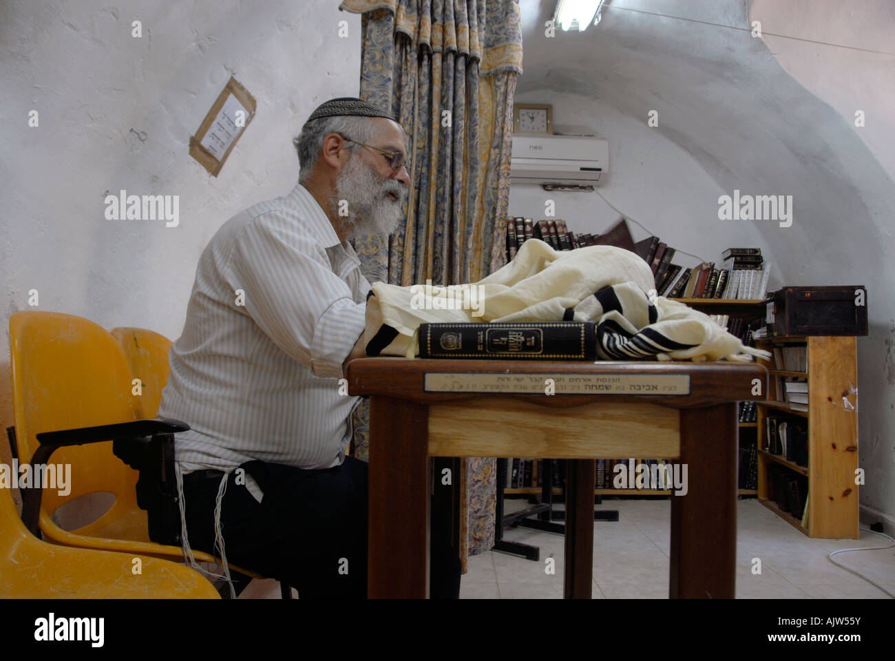 A Jewish settler inside the tomb of Jesse and Ruth located within the ...