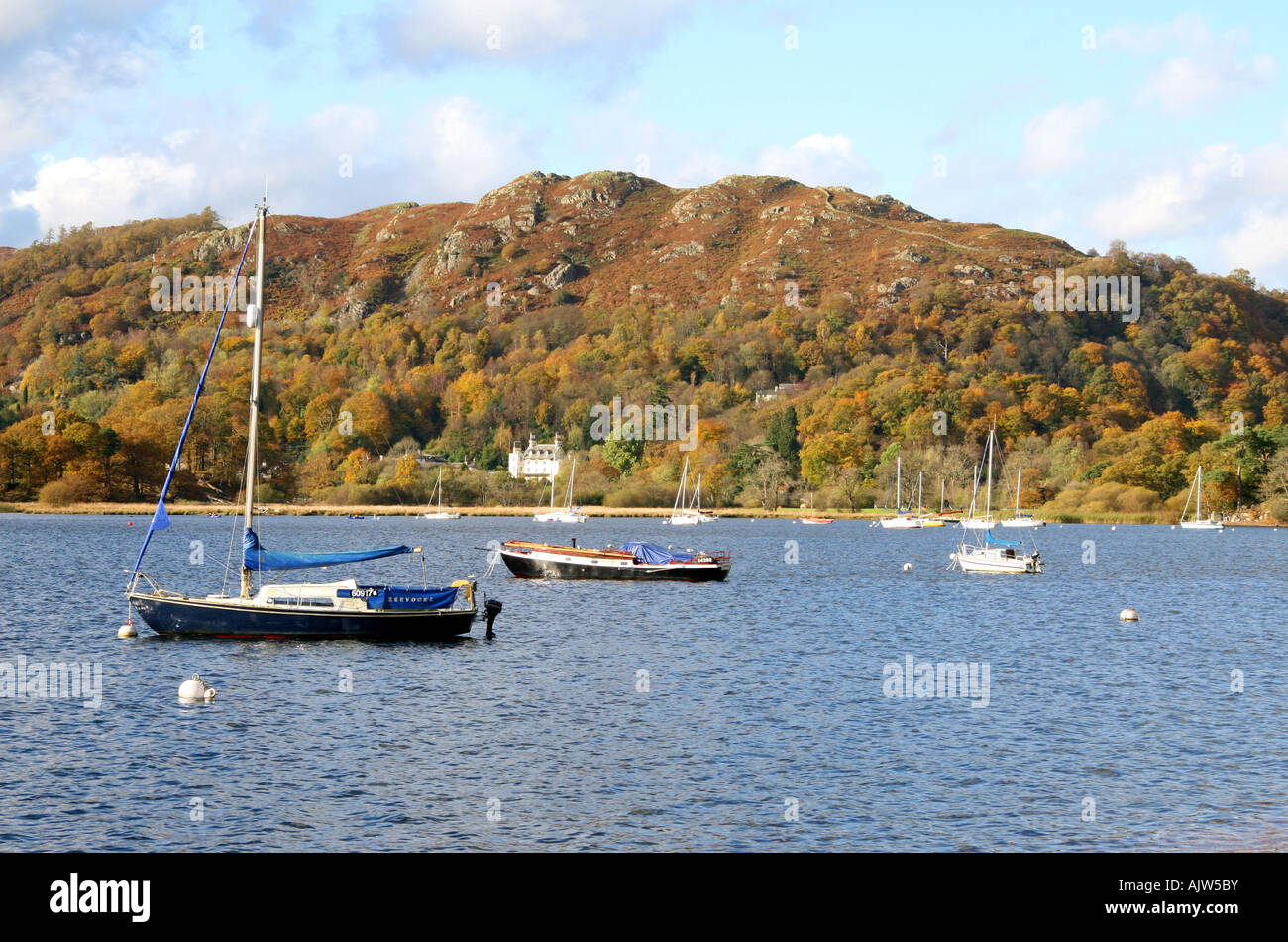 Sailing boats on Lake Windermere in the Autumn sunshine during October ...