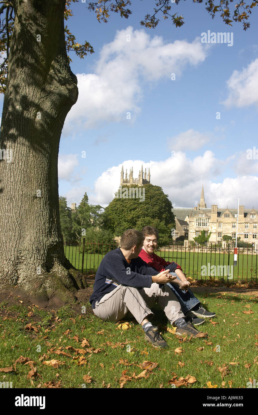 Two men sitting under tree hi-res stock photography and images - Alamy