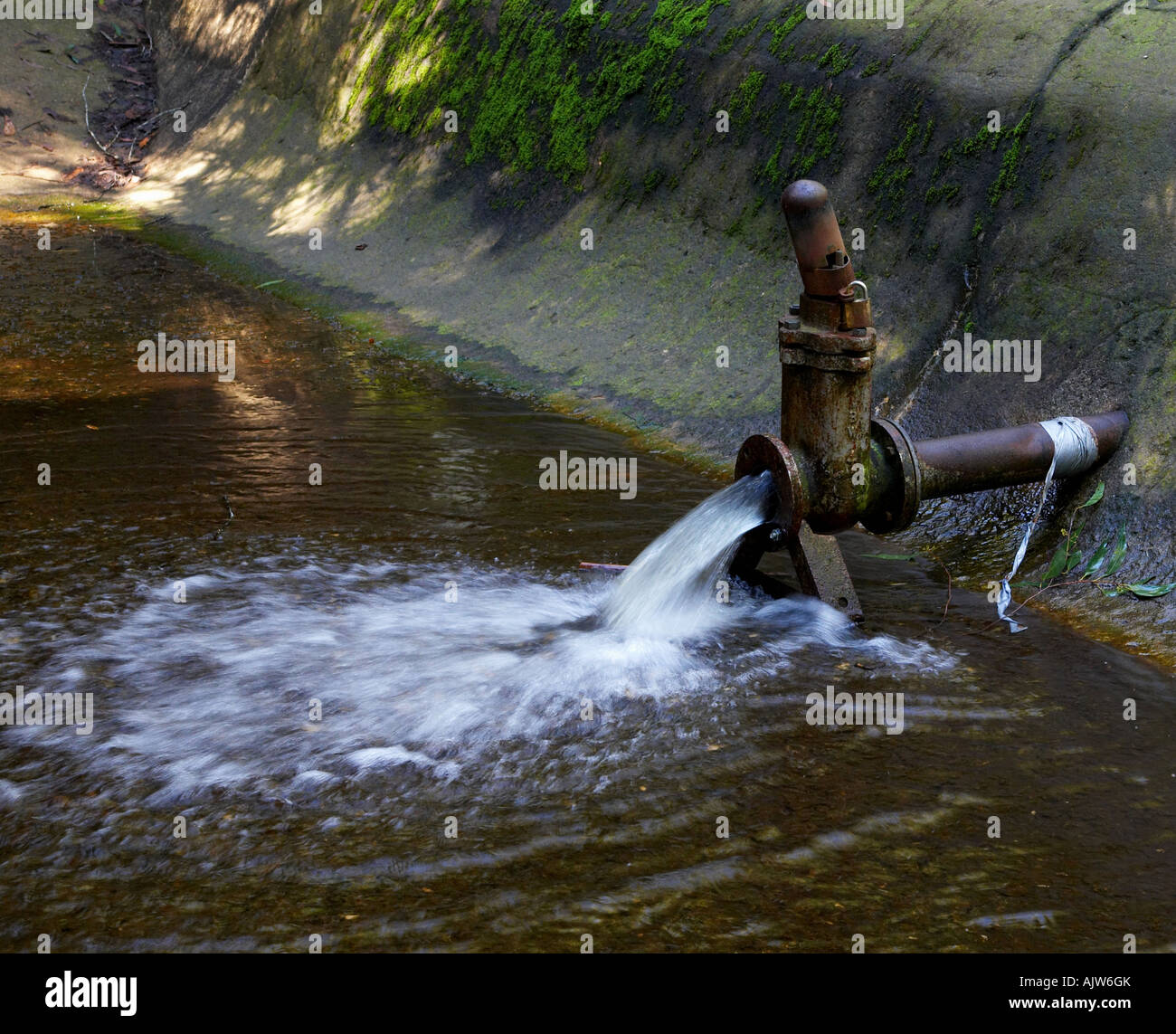 Water outlet in water pumping station Stock Photo - Alamy