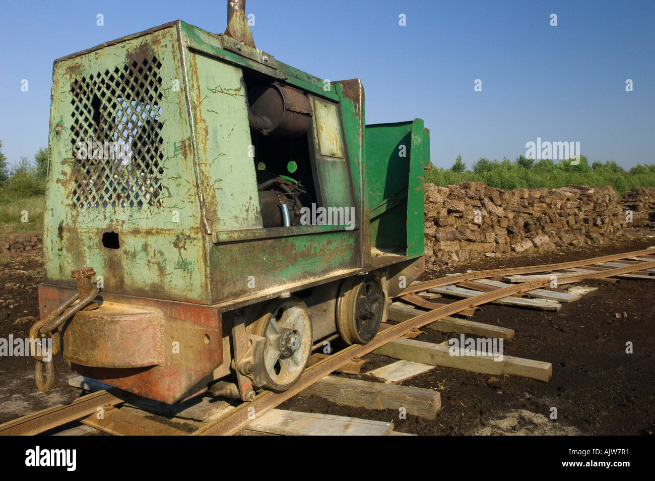 Stacks of peat on moor railway Stock Photo - Alamy