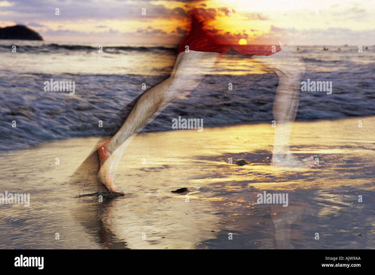 COSTA RICA MAN RUNNING ON BEACH AT SUNSET Stock Photo - Alamy