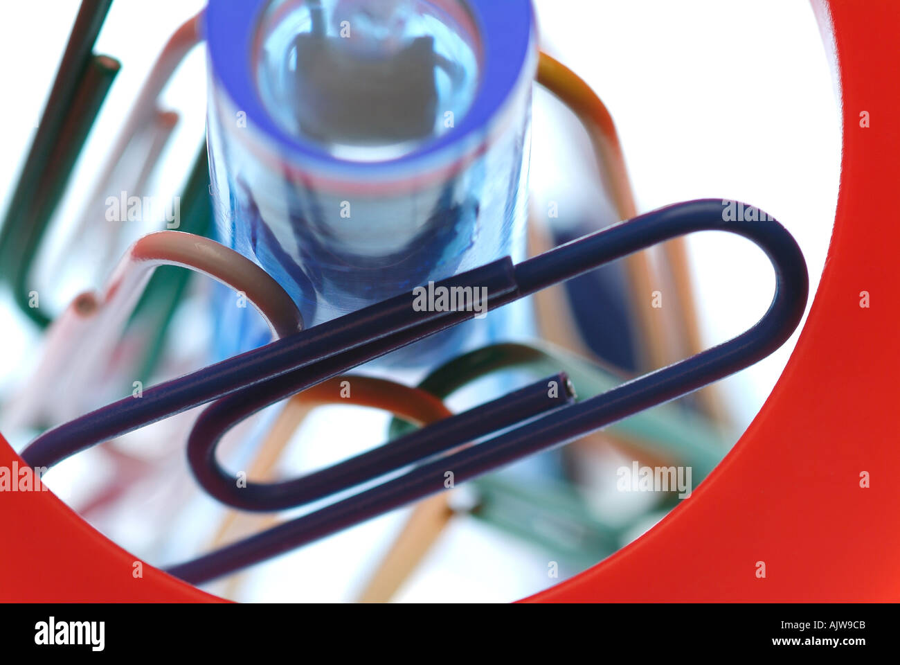 paper clips in desk holder Stock Photo - Alamy