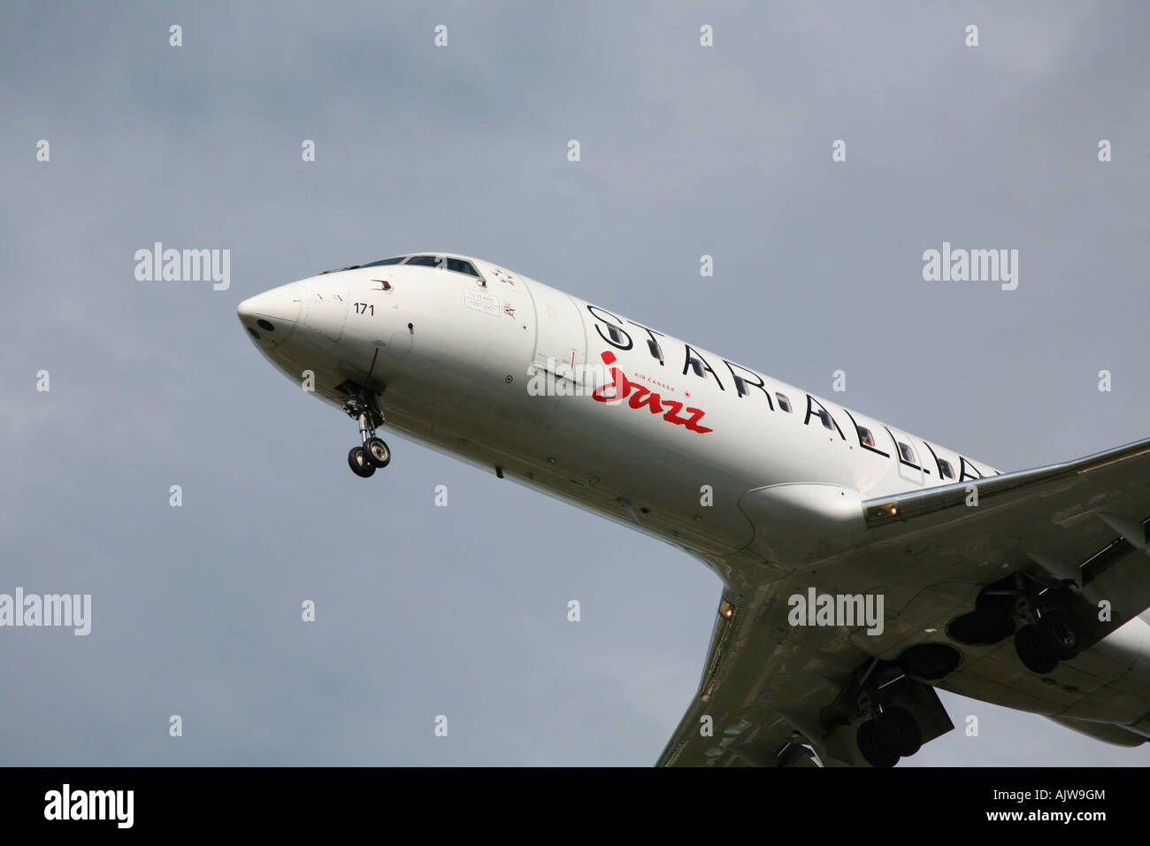 Passenger jet taking off Stock Photo - Alamy