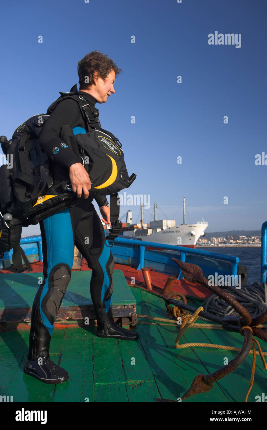 Woman diver standing hi-res stock photography and images - Alamy