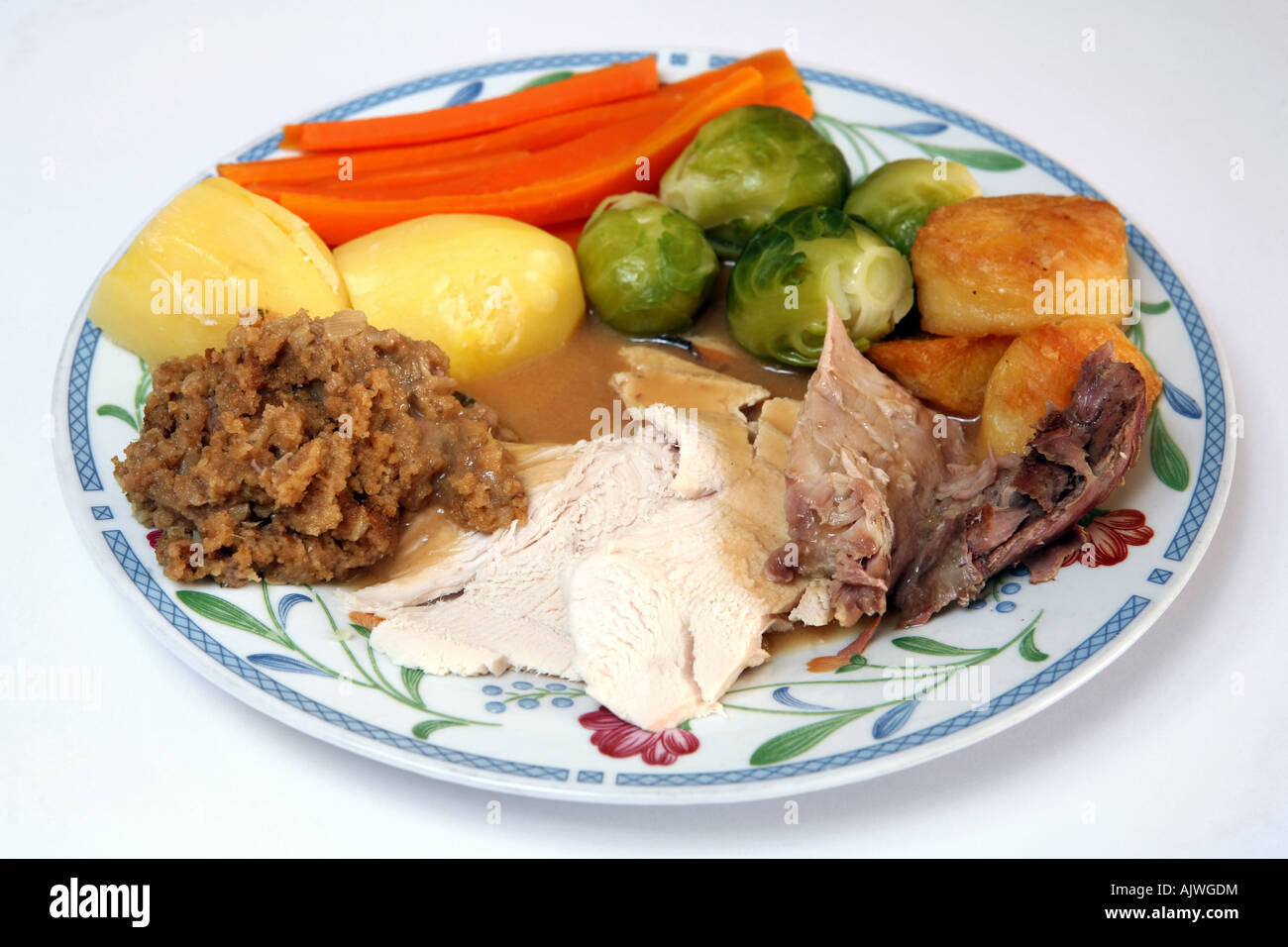 A plate with traditional festive turkey brussels sprouts roast and ...