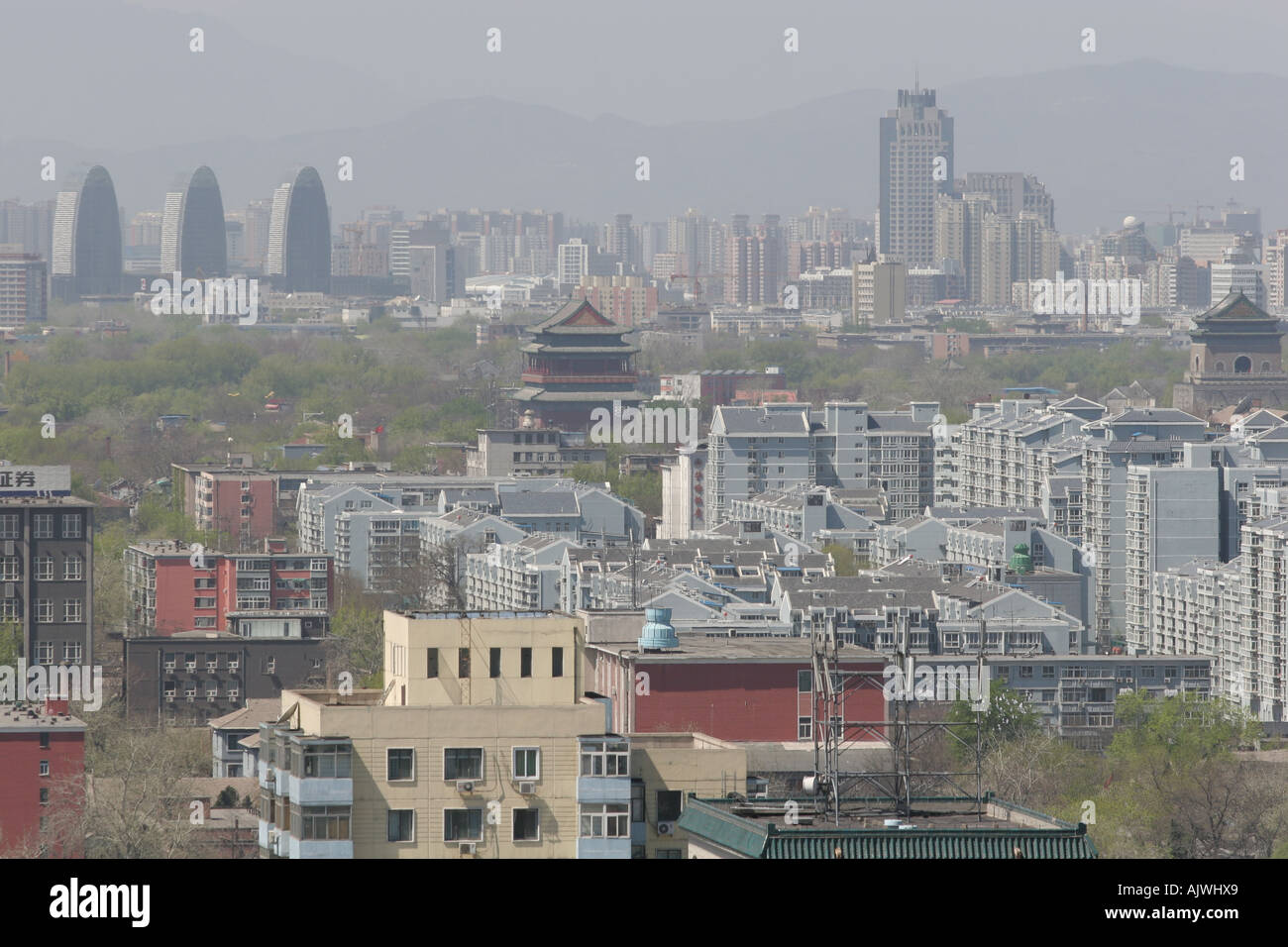 New build residential housing alongside traditional temple structures ...