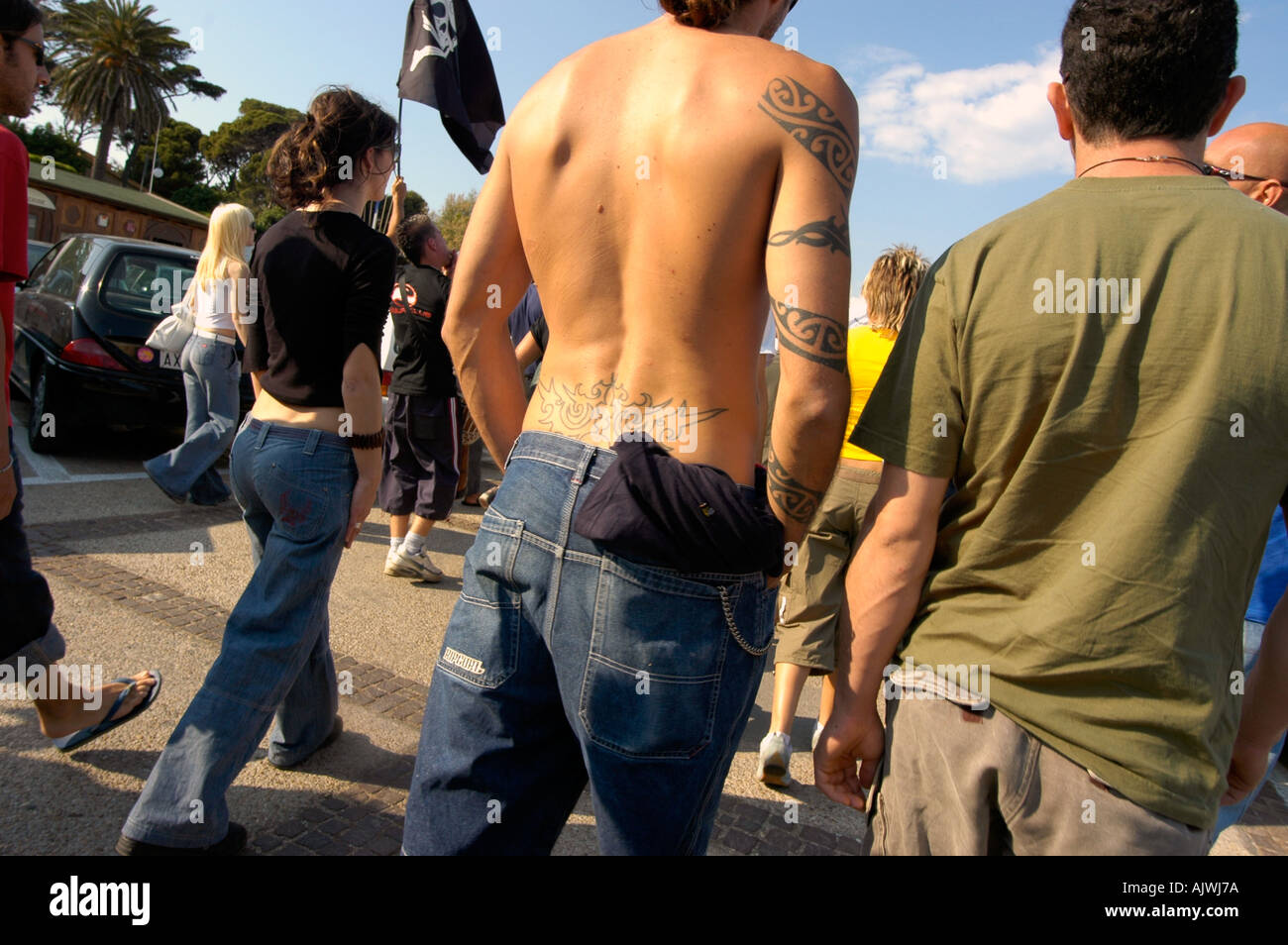 people demonstrating on street, some carryng flags Stock Photo - Alamy