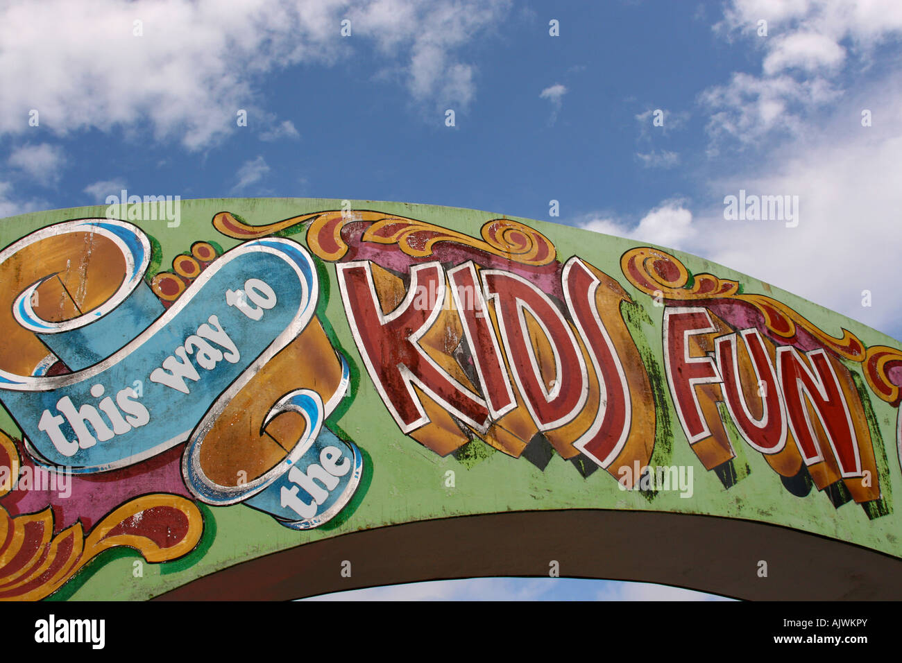 Old colourful sign for kids fun at childrens fairground on Brighton ...