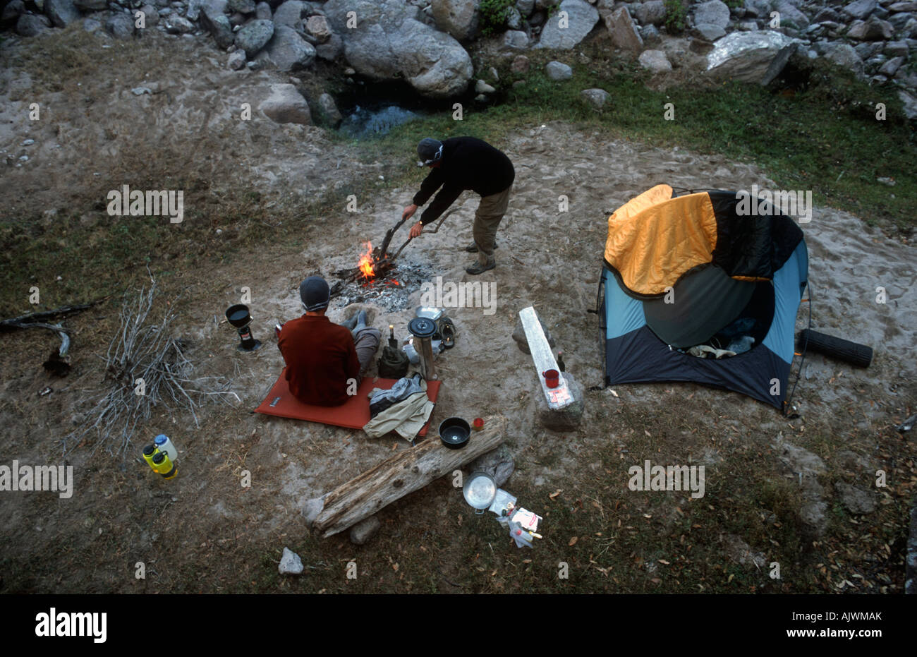 trekker tending camp tending fire Copper Canyon Mexico Stock Photo - Alamy