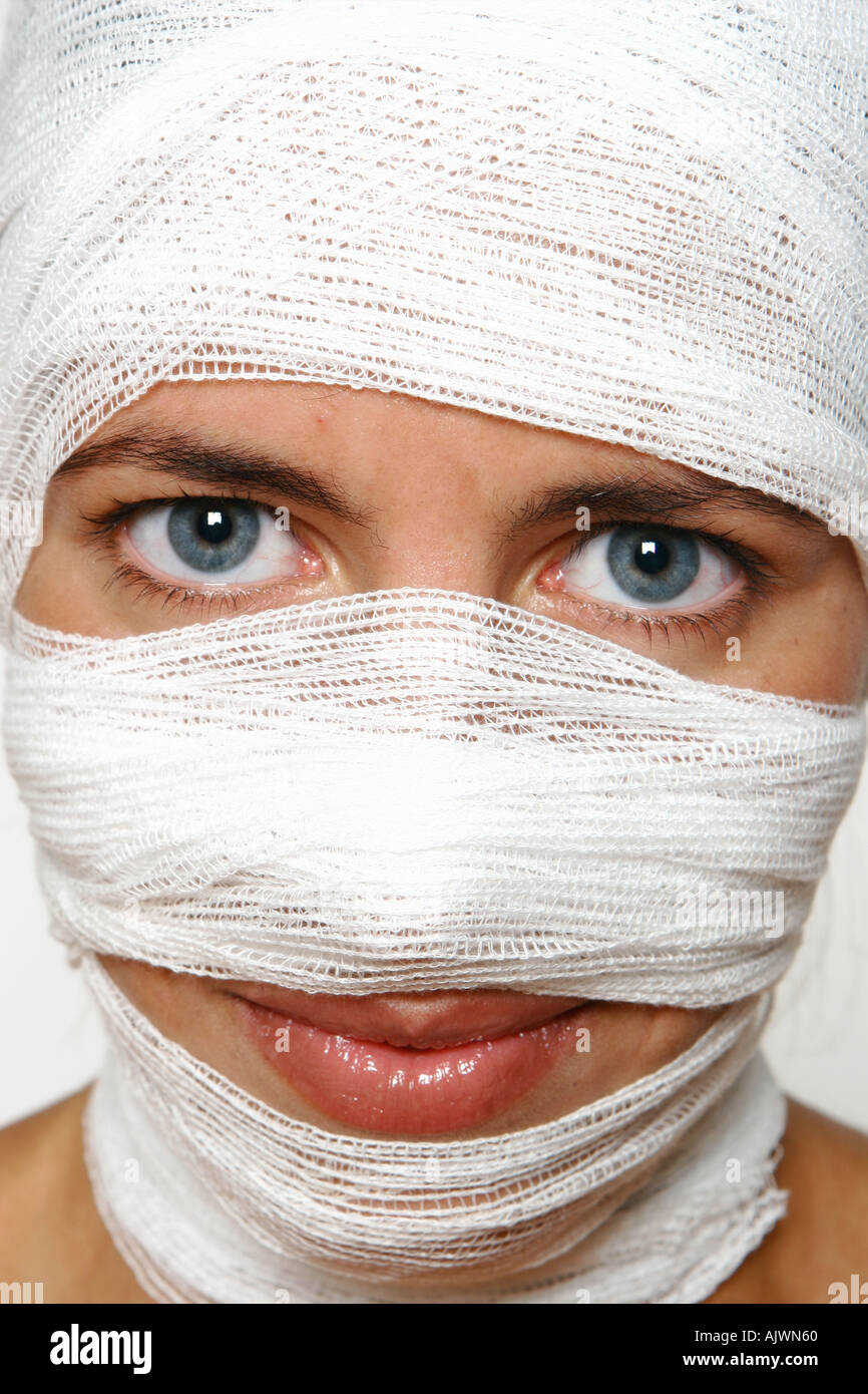 Head shot of woman with a white head dressing Stock Photo - Alamy