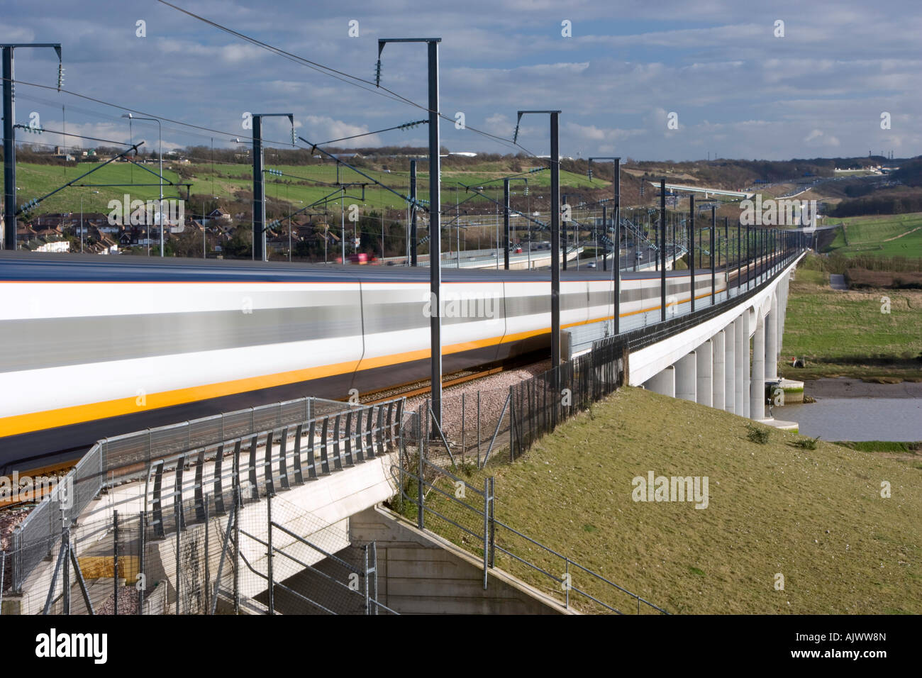 Eurostar high speed train crossing Medway river bridge at 186mph Stock ...