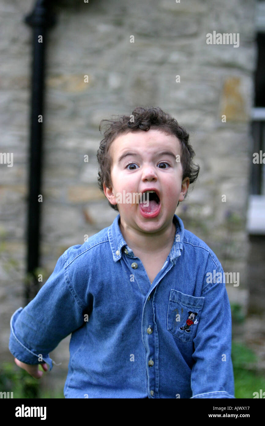 Boy screaming running hi-res stock photography and images - Alamy