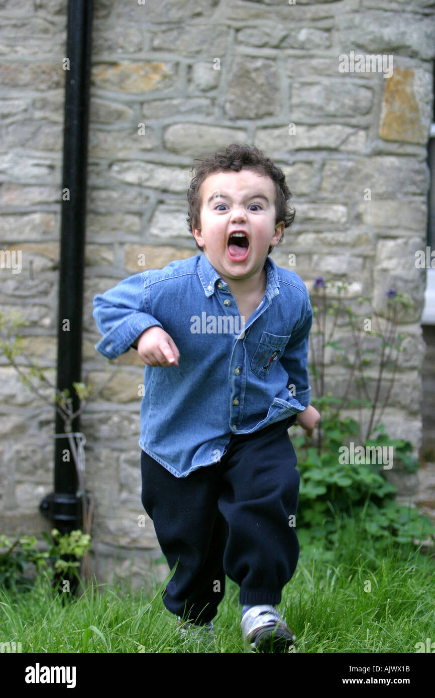 Child running towards screaming hi-res stock photography and images - Alamy