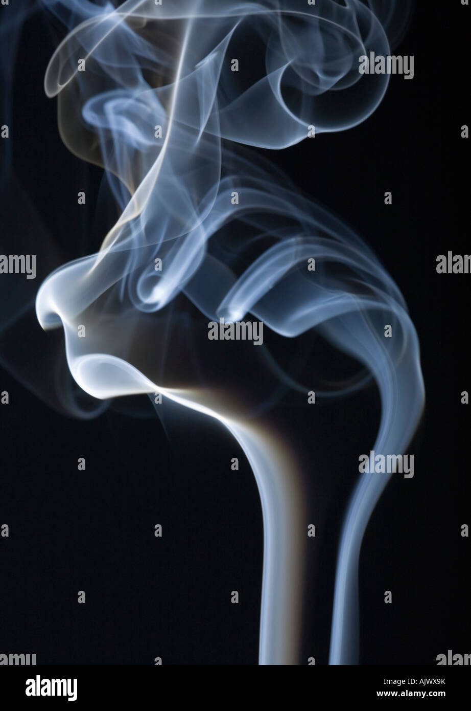 Smoke from a burning incense stick Stock Photo - Alamy