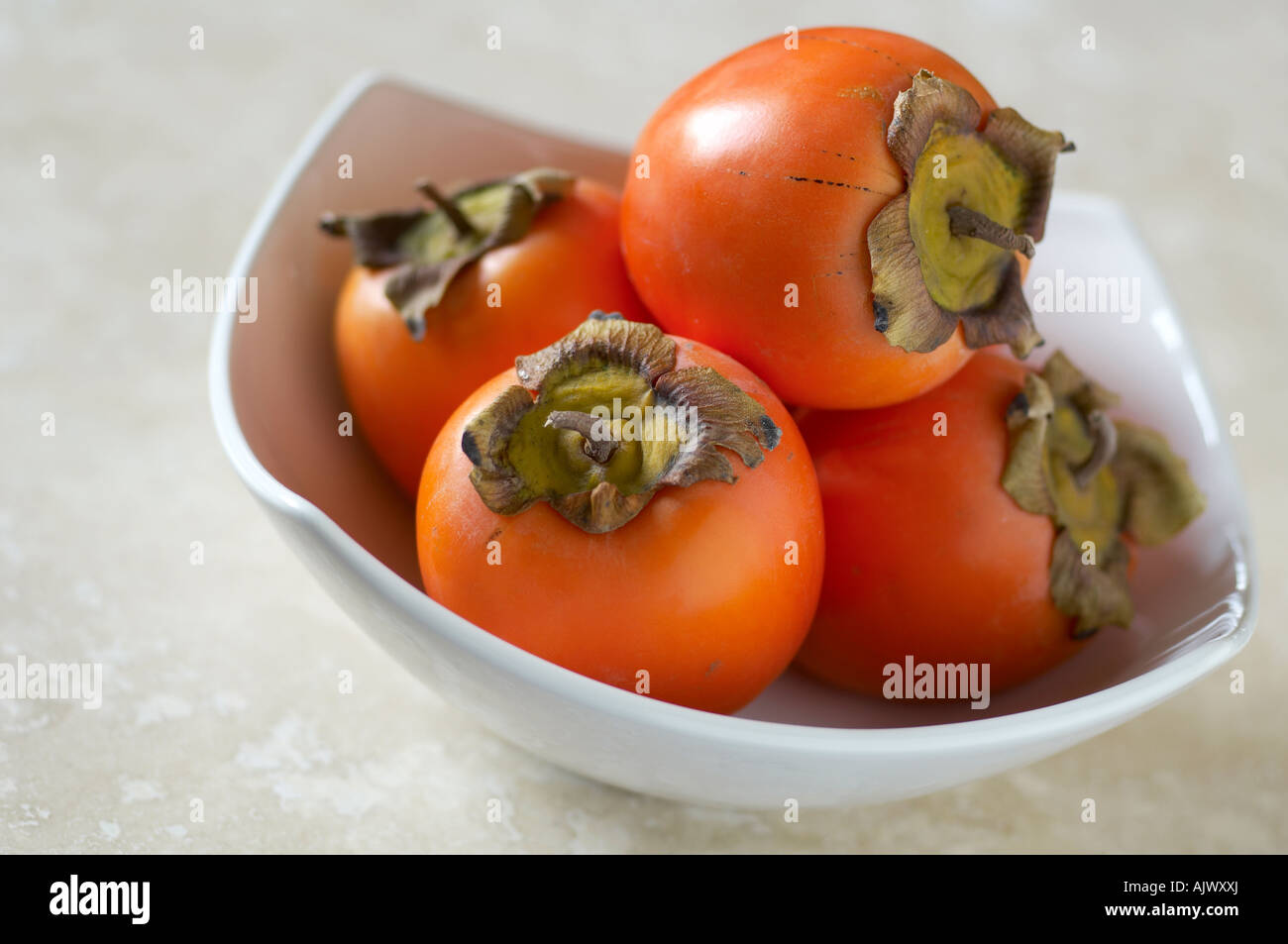 Persimmon or Sharon Fruit Stock Photo - Alamy