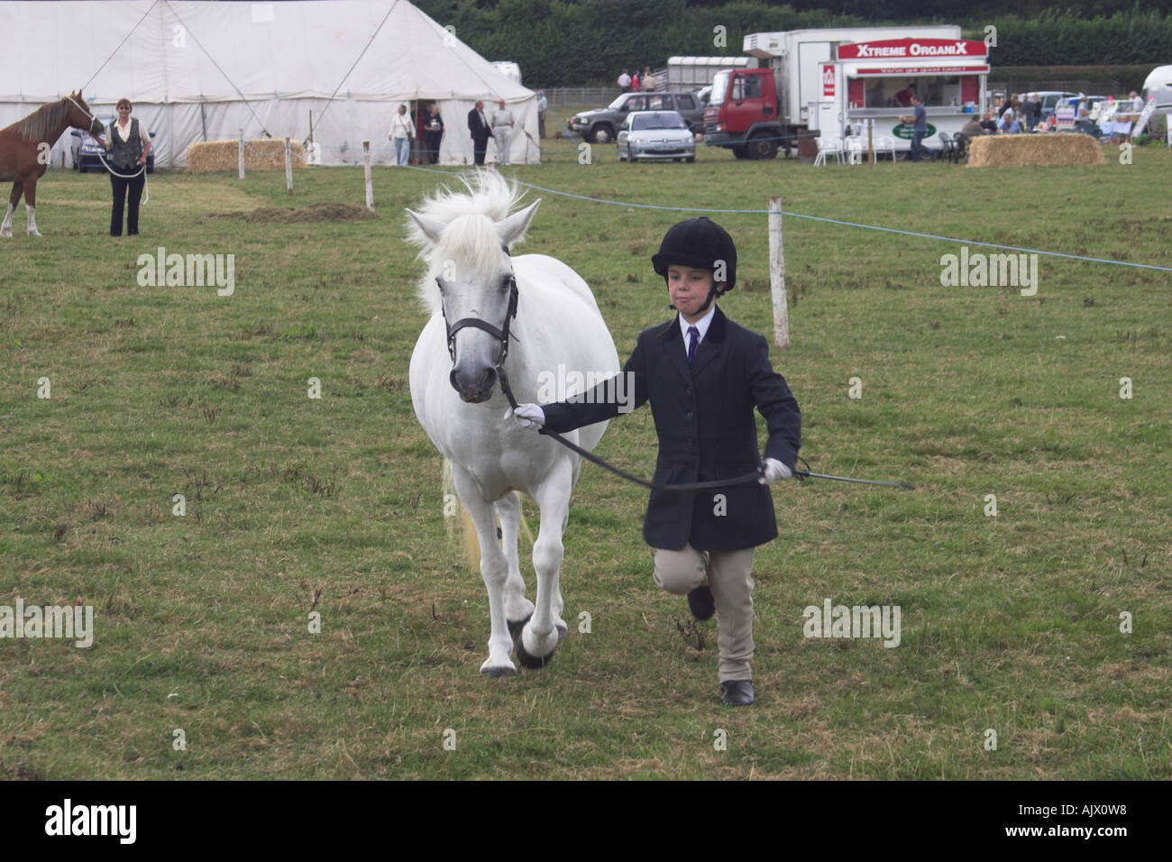 Rider leading pony hi-res stock photography and images - Alamy