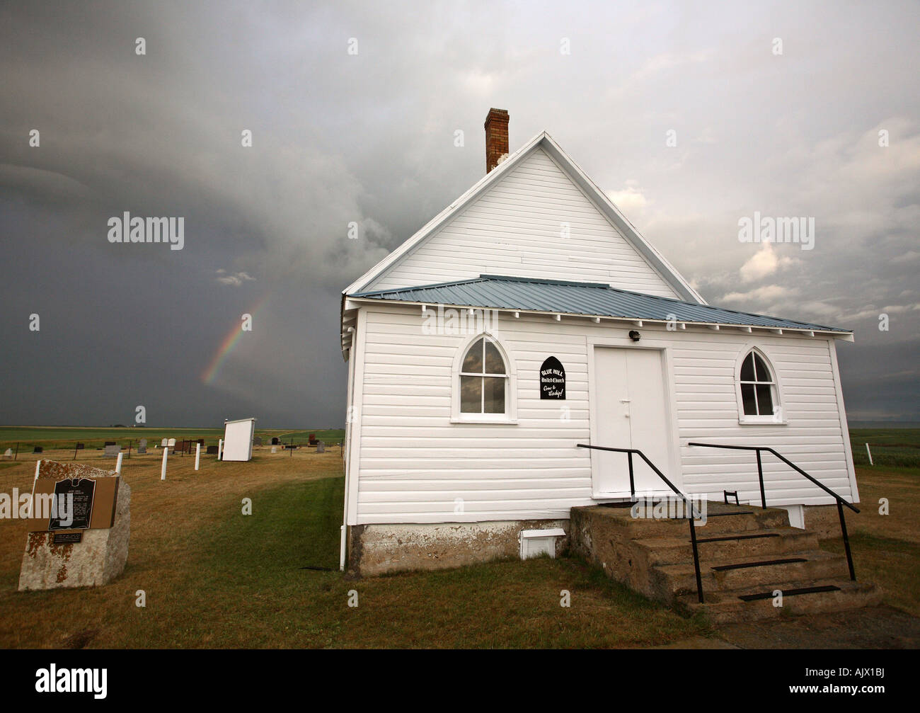 Storm clouds above a Saskatchewan country church Stock Photo - Alamy