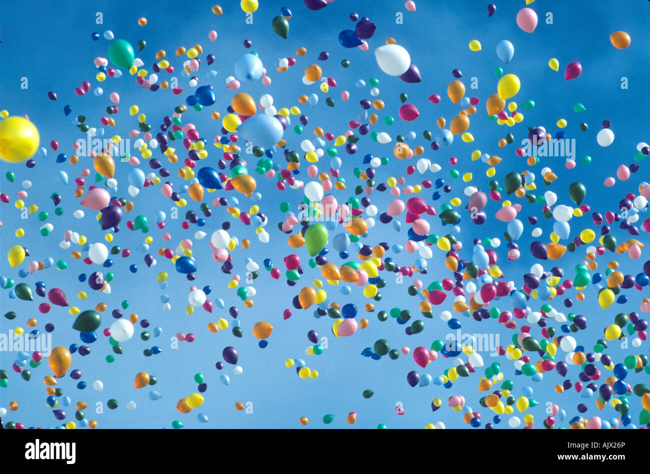 Colorful balloons drifting into the sky Stock Photo - Alamy