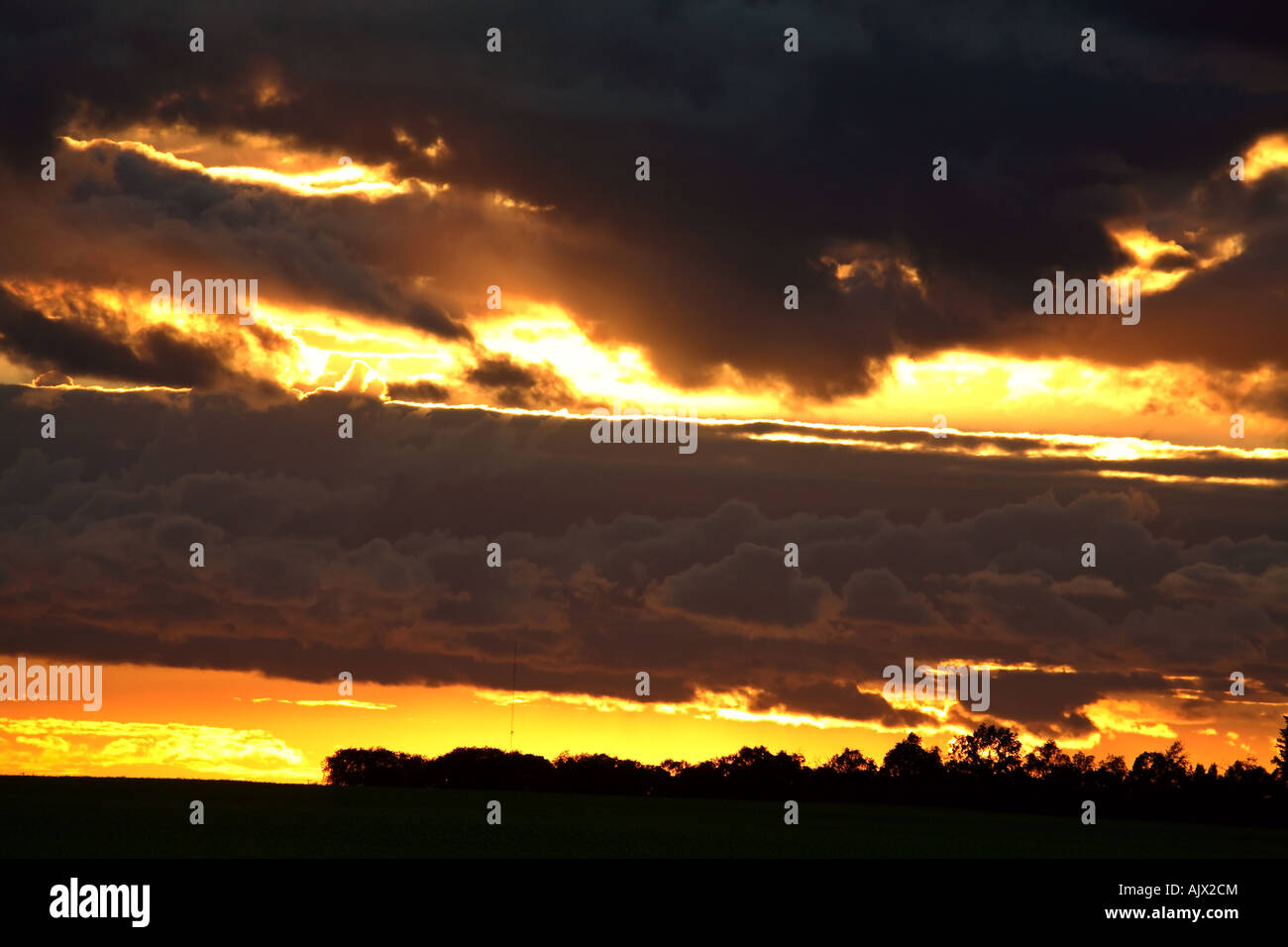 Sunset sun hidden behind hi-res stock photography and images - Alamy