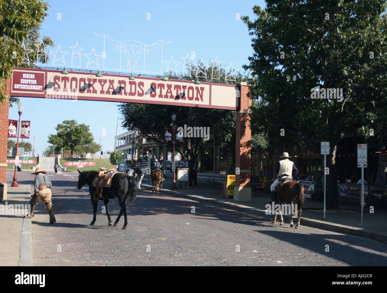 cowboys and Fort Worth Stockyards station sign in National Historic ...