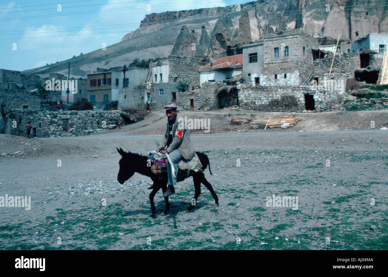 Man riding donkey Stock Photo - Alamy