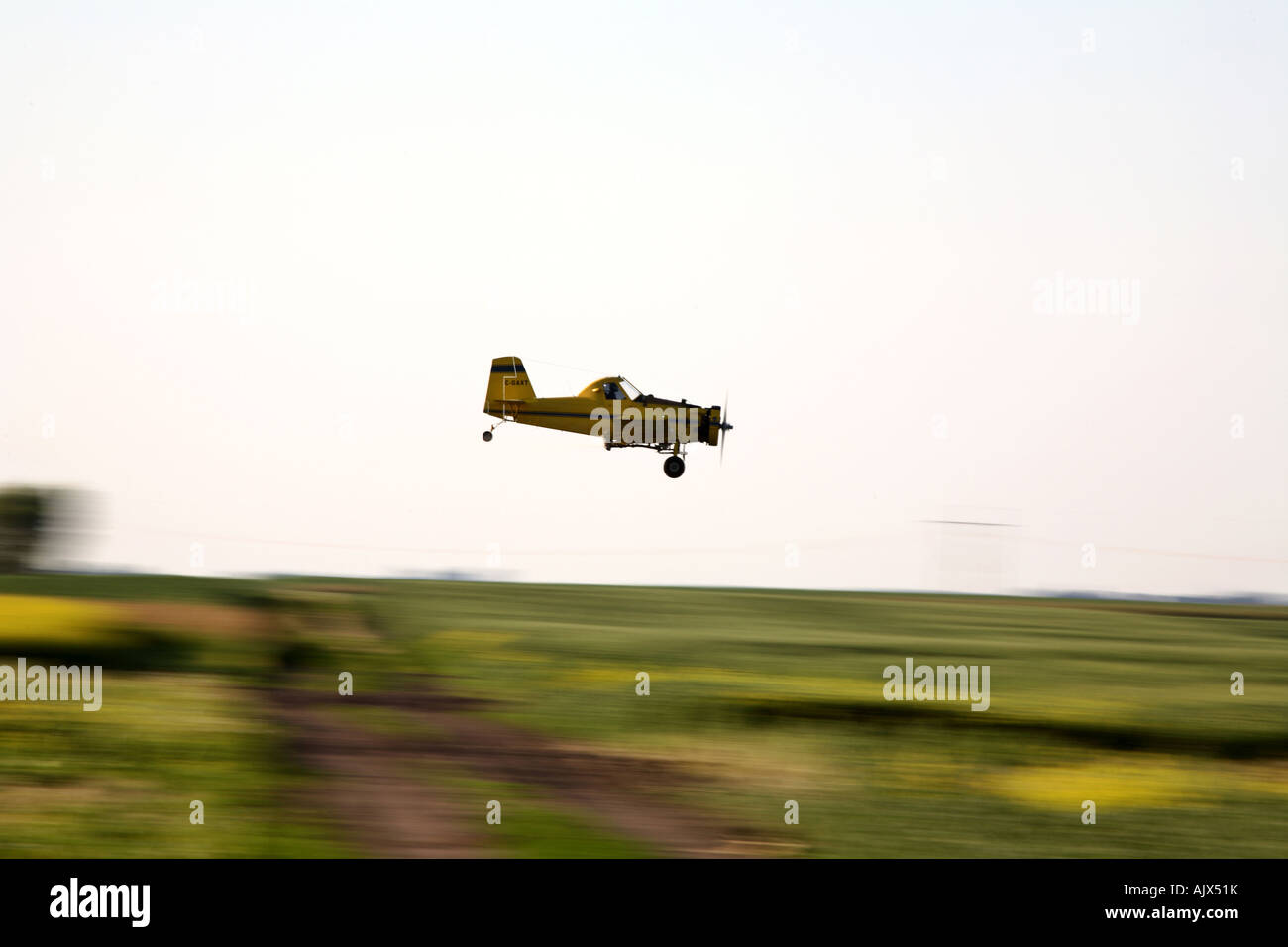 Aircraft spraying crops in scenic Saskatchewan Stock Photo - Alamy