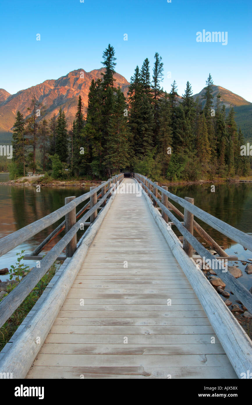 Bridge to mountain lake island Jasper National Park Alberta Canada ...