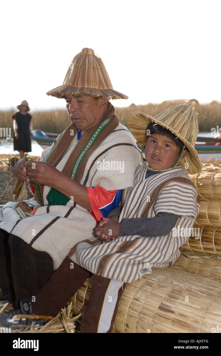 Uros Iruitos Indian boy and his grandfather living on Phuwa island a ...