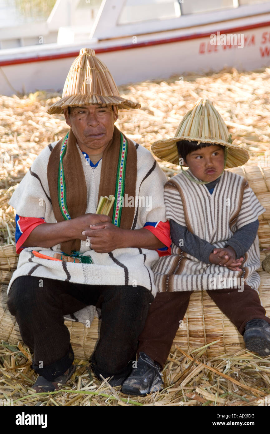 Uros Iruitos Indian boy and his grandfather living on Phuwa island a ...