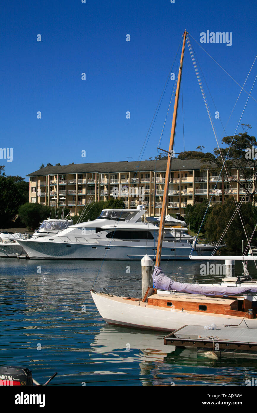 Sailing boat and luxury cruisers moored at Pittwater Sydney Australia ...