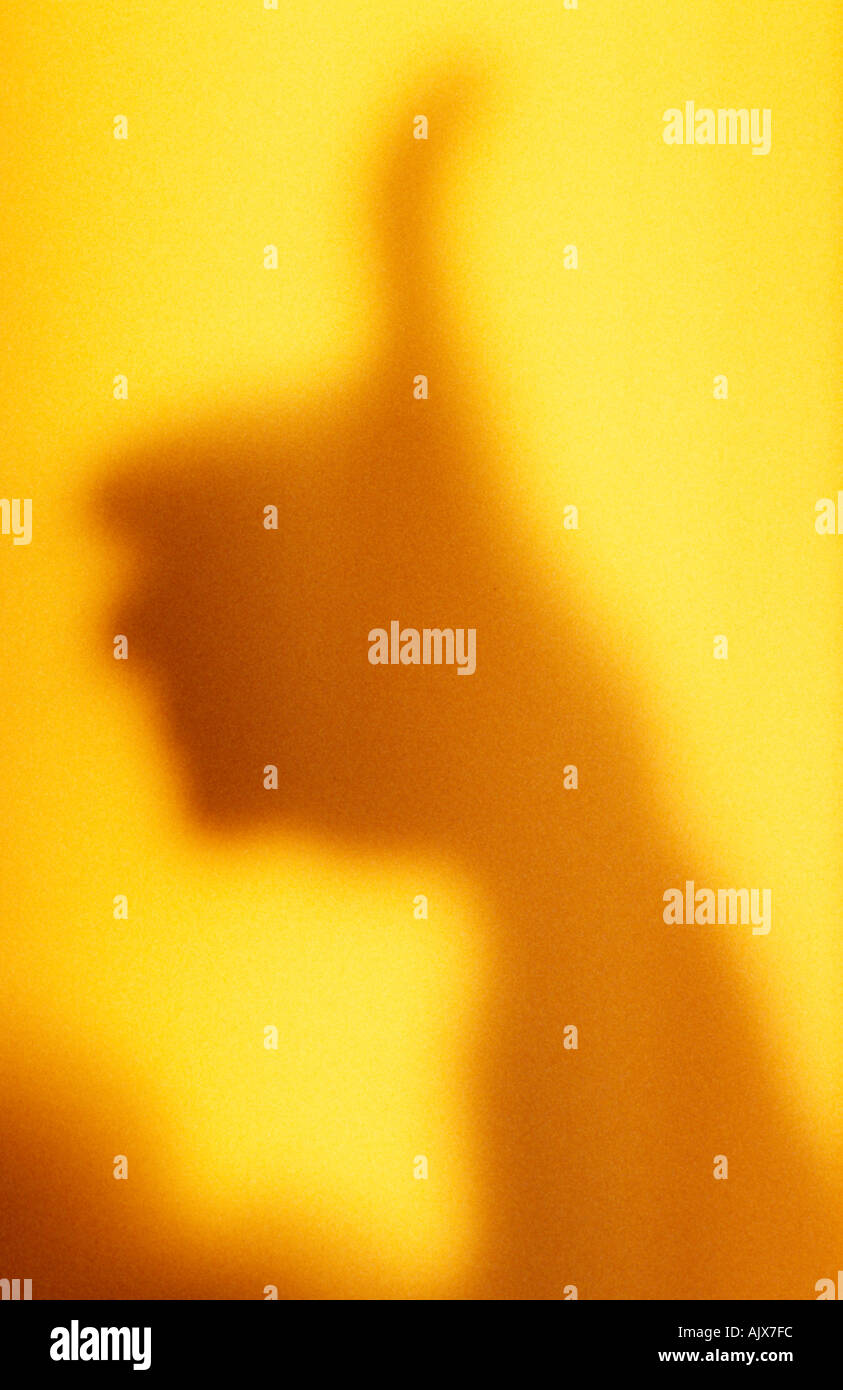 Shadow of a hand giving a thumb up sign Stock Photo - Alamy