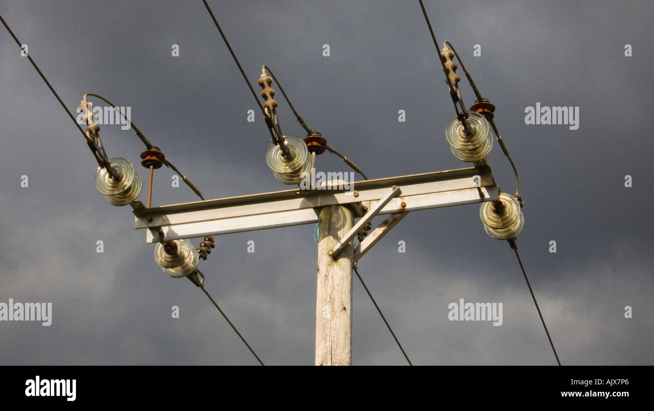 overhead electricity power cables against stormy sky Stock Photo - Alamy