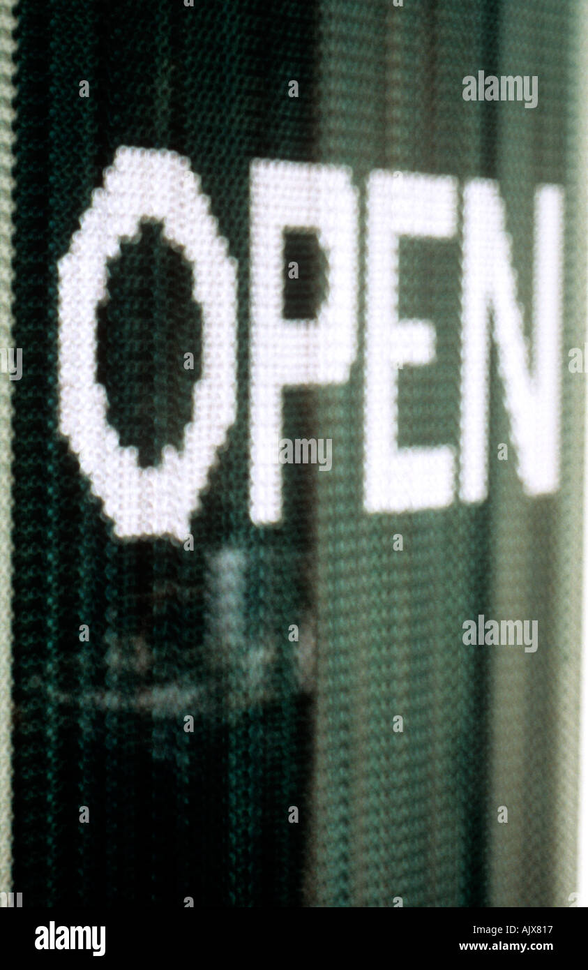 Sign saying Open on chain link curtain in shop door Stock Photo - Alamy