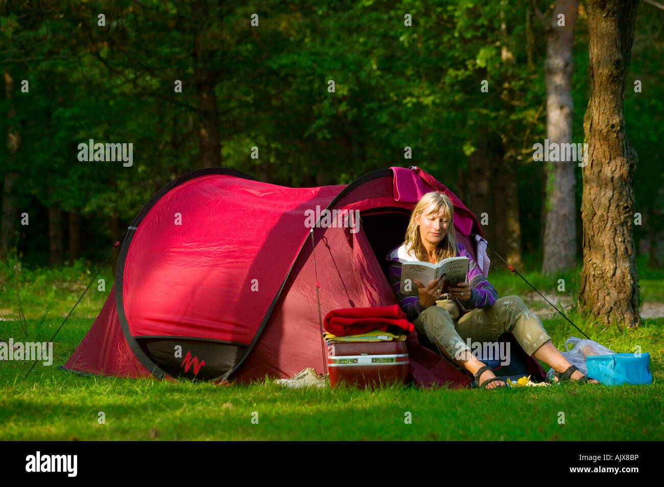 Camping tents female woman hi-res stock photography and images - Alamy
