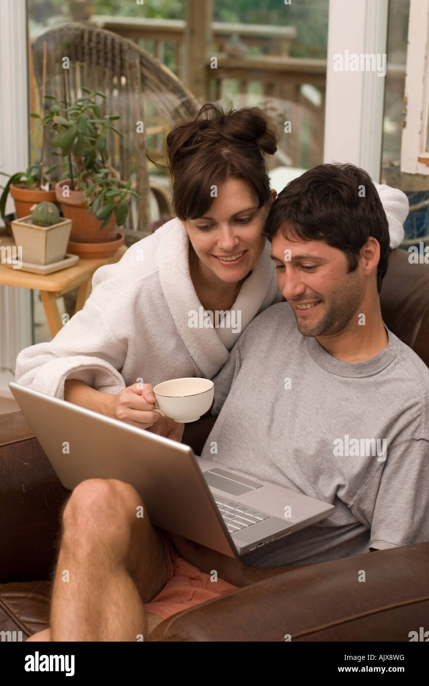 couple with computer Stock Photo - Alamy