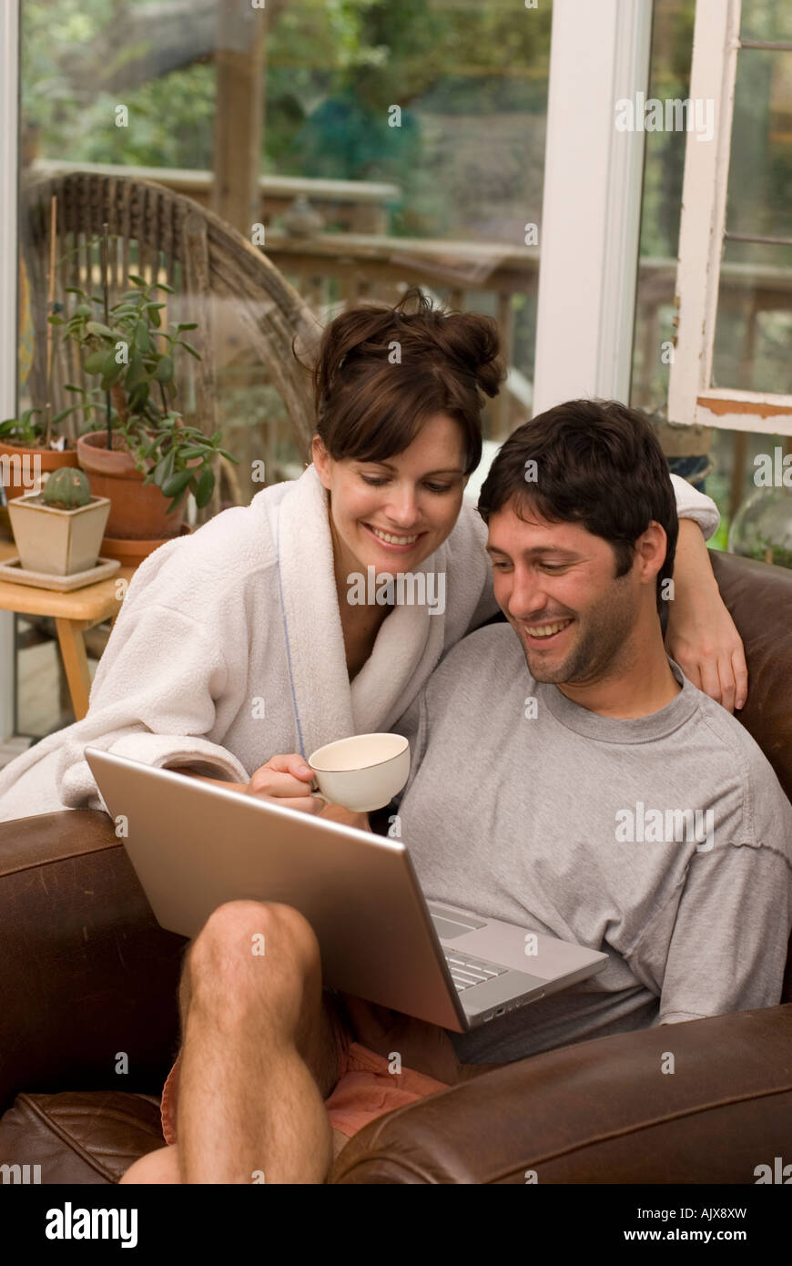 couple with computer Stock Photo - Alamy