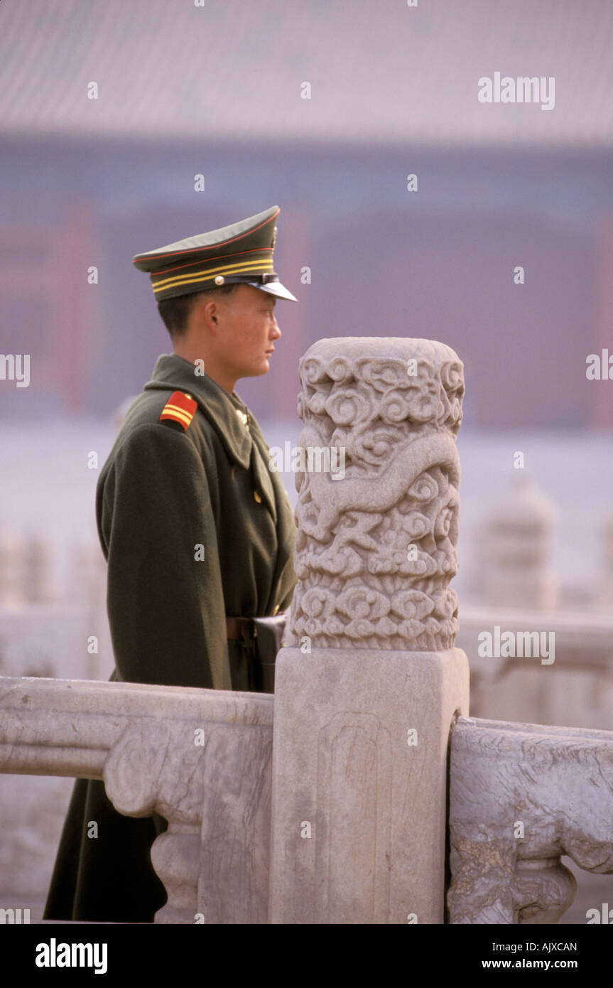 Asia, China, Beijing, Forbidden City. Policeman on Golden Water Bridge ...