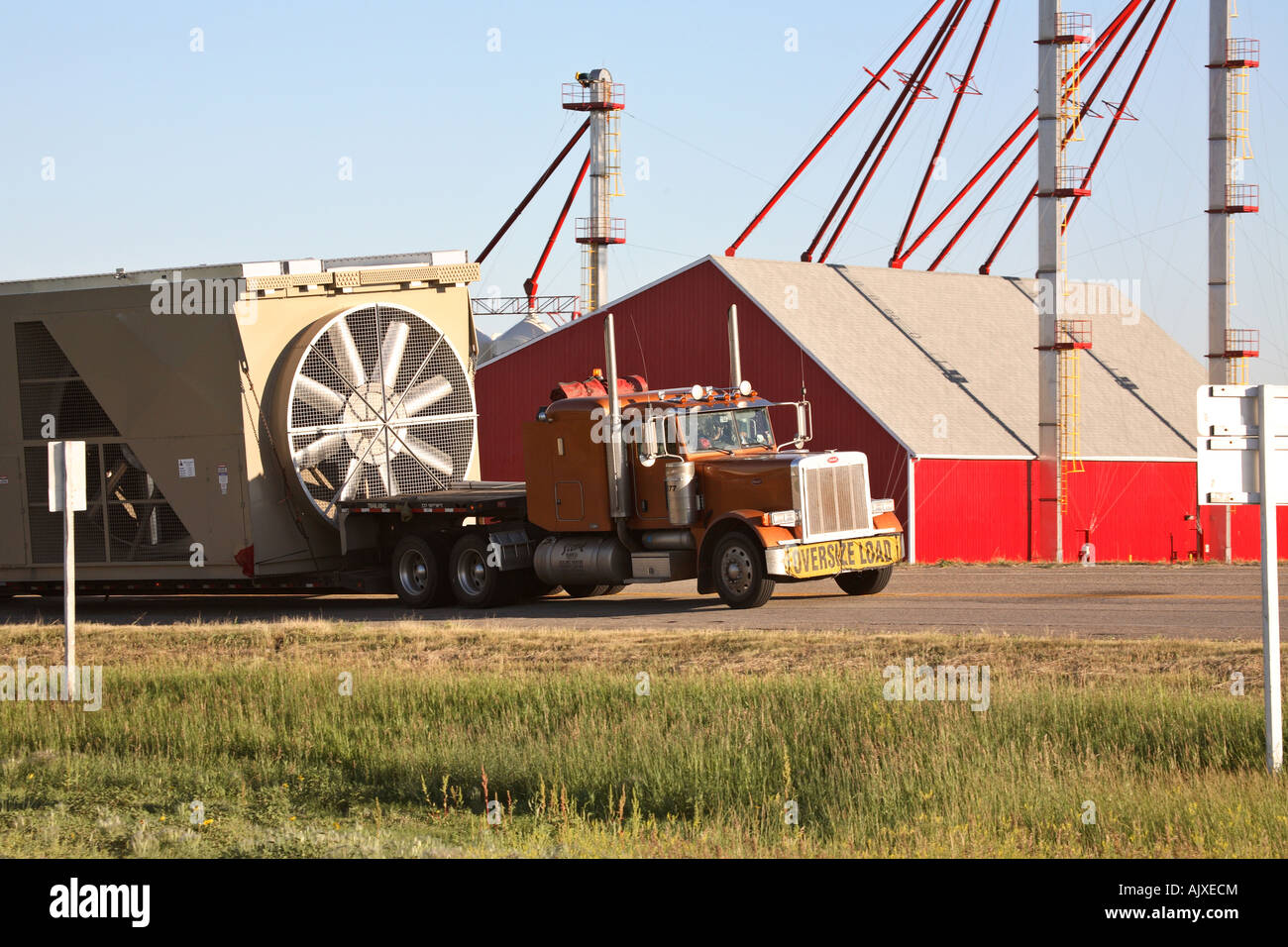truck hauling giant blower fan Stock Photo - Alamy