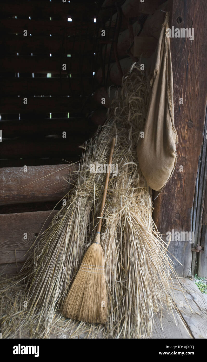 Staw broom at a farm Stock Photo - Alamy
